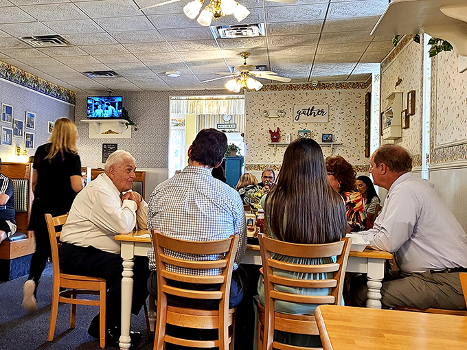 The dining room buzzes with conversation and laughter, as strangers become neighbors over plates of home-cooked goodness.