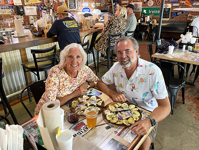 The universal language of "this is so good" requires no translation. Happy diners sharing the seafood wealth and making memories.