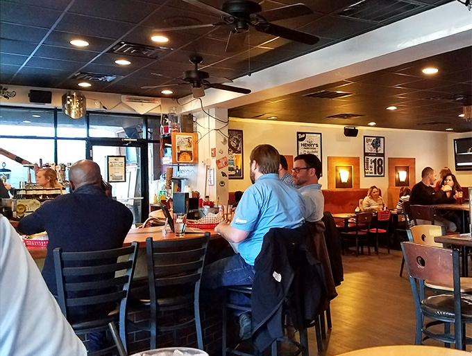 The dining room buzzes with the satisfied murmurs of patrons experiencing what can only be described as burger enlightenment.