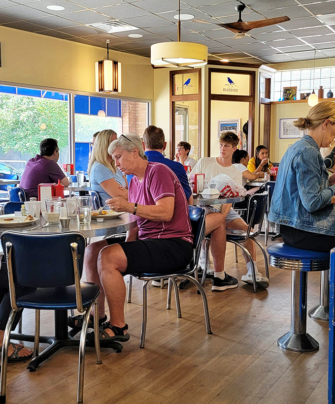 Every table tells a story at Bluebird, where strangers become neighbors and calories don't count before noon.