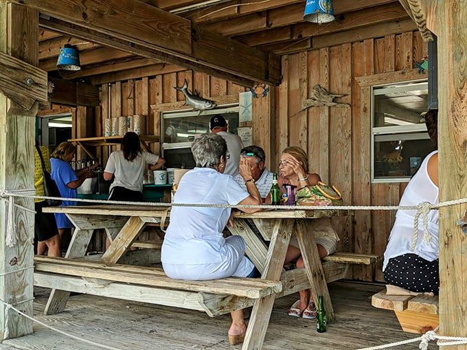 The outdoor dining area where strangers become friends over shared appreciation of fresh catches and Florida sunshine.