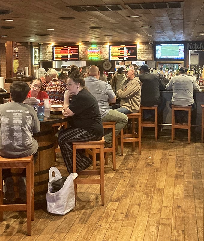 The bar area buzzes with locals and travelers alike. Everyone united by the universal language of good food and cold drinks.