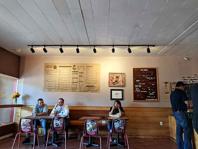Simple wooden tables and track lighting create the perfect stage for the real star of the show&mdash;sandwiches that deserve their own spotlight and standing ovation.