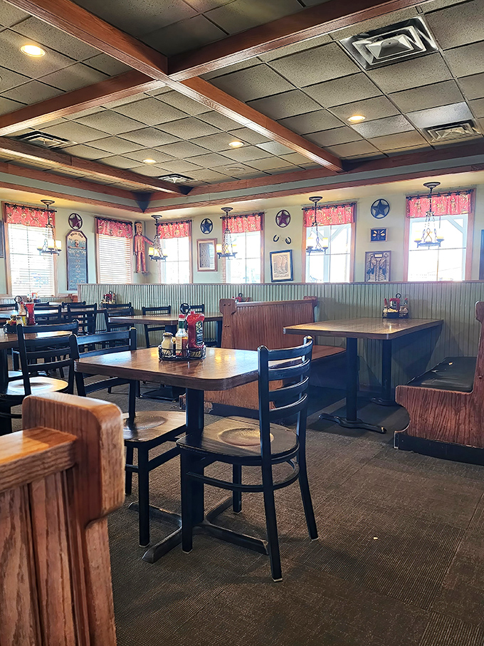Empty tables waiting for the lunch rush like actors before curtain call &ndash; each wooden booth holding decades of local stories.