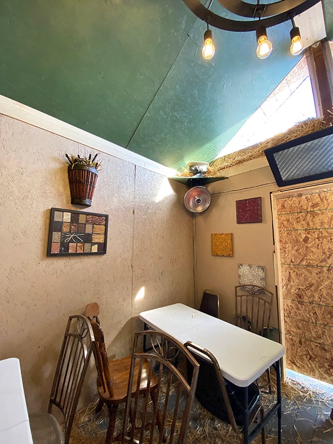 A dining room where conversations flow as easily as the BBQ sauce. The green ceiling and simple decor let you focus on what matters: the food and company.