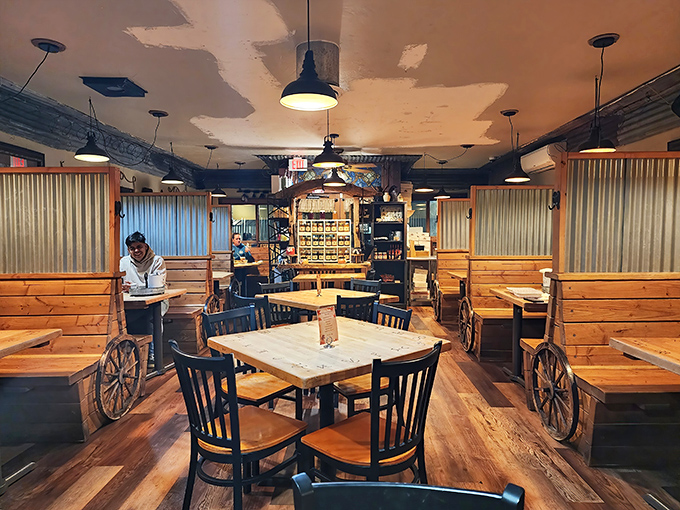 Wagon wheel booths and wooden tables create a dining room where John Wayne would feel right at home ordering seconds of everything on the menu.