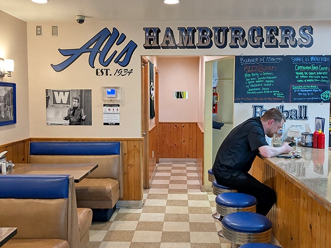 The dining area where time stands still, featuring wood paneling that's witnessed more delicious moments than a Food Network highlight reel.
