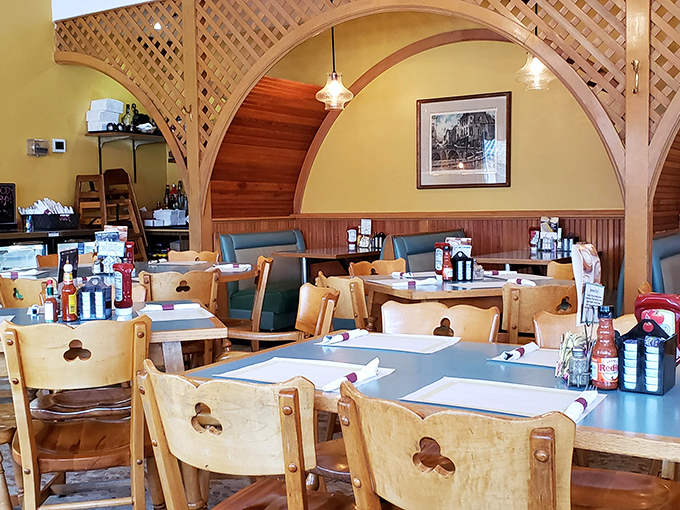 Lattice woodwork and cozy booths create dining nooks that feel like you've discovered your own private breakfast sanctuary.