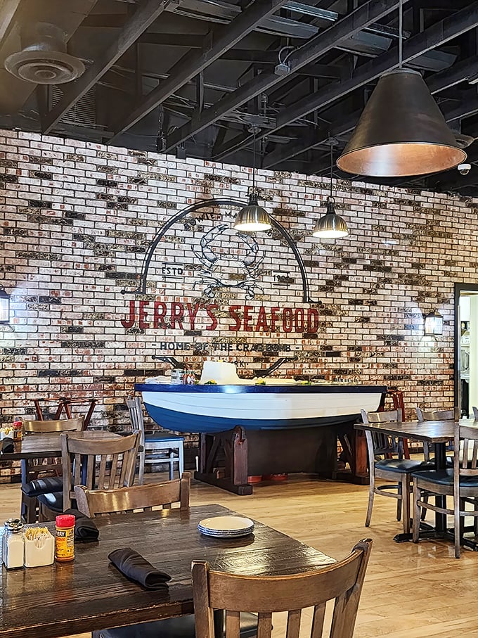 The exposed brick wall featuring Jerry's logo and a boat centerpiece creates a maritime charm without going overboard on nautical kitsch. Seafood theater-in-the-round.