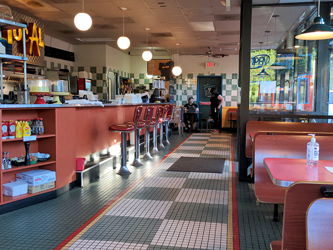 The dining area's retro charm creates that rare atmosphere where both hipsters and grandparents feel equally at home.
