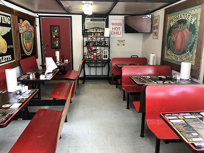 Red booths, simple tables, and the promise of BBQ bliss. This dining room has hosted countless sauce-stained smiles and satisfied sighs.