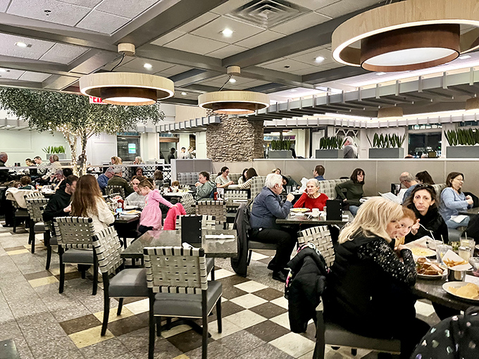 The dining area buzzes with conversation and clinking silverware, a symphony of New Jersey diner culture in full swing.