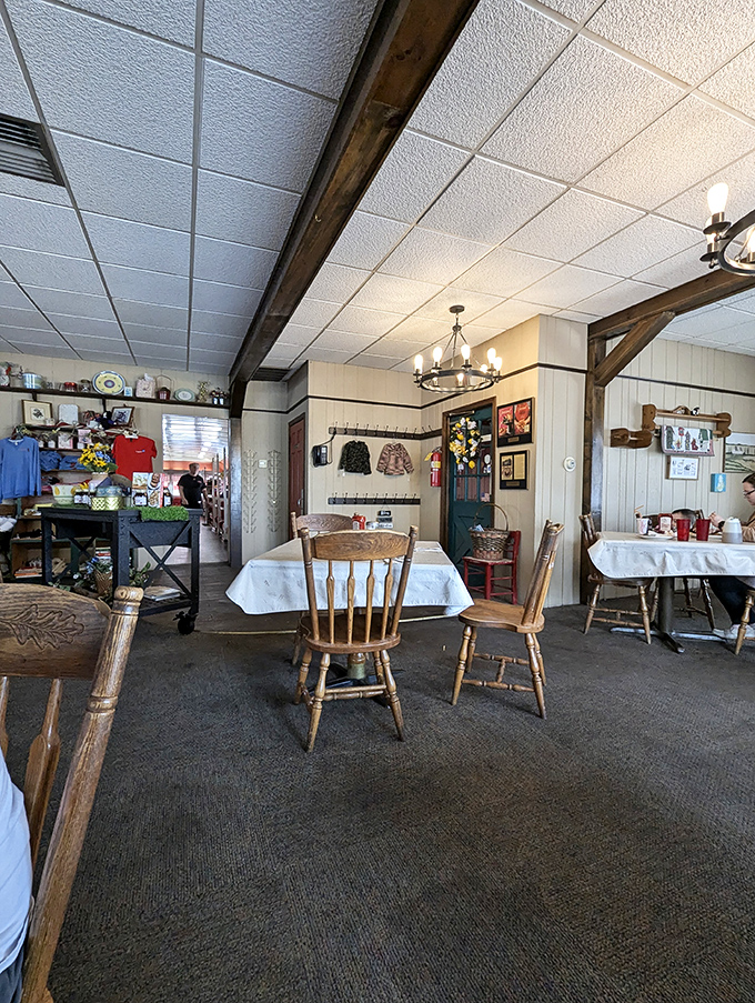 The dining area offers a more rustic counterpoint to the diner section, with wooden beams and country charm creating a cozy Pennsylvania Dutch atmosphere.