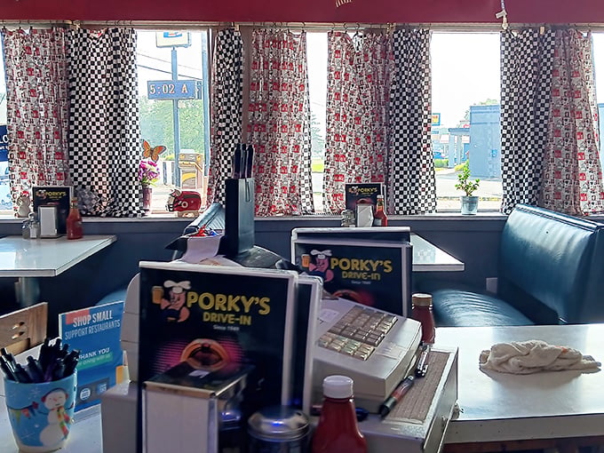 Checkered curtains frame booths where countless first dates, family celebrations, and regular Tuesday lunches have unfolded.