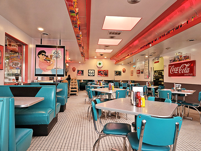 Turquoise booths and chrome accents create the quintessential diner atmosphere where calories don't count and nostalgia flows freely.
