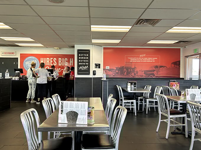 The dining area hums with conversation and anticipation. Every table tells a story; every chair has supported decades of satisfied diners.