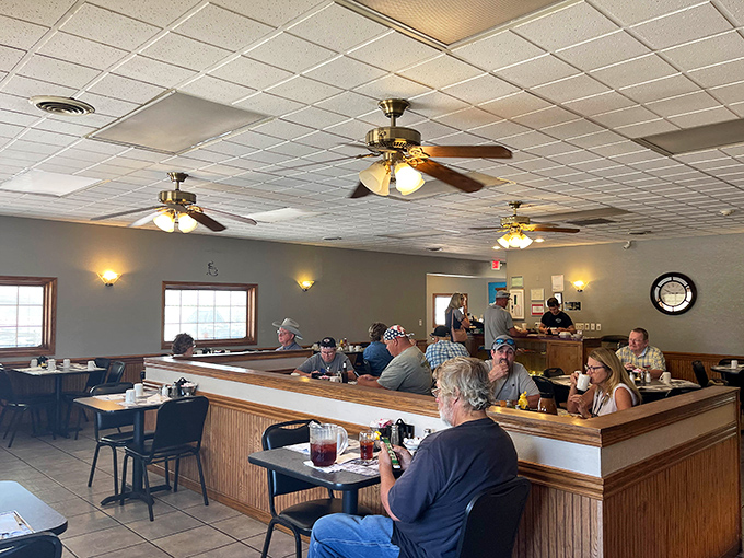 The tiered dining room design: where every seat feels like the best in the house and eavesdropping on local gossip comes standard.