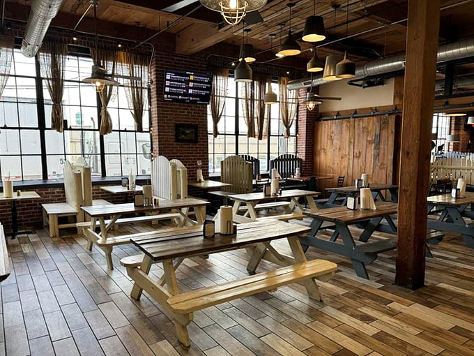 Picnic tables and natural light create an atmosphere where strangers become friends over shared meat sweats.