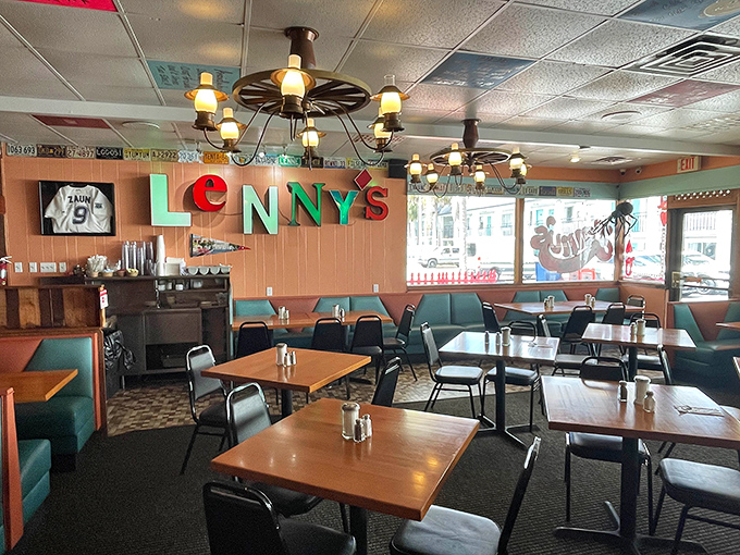 The dining area's colorful lettering and teal booths create that perfect "I've discovered somewhere special" atmosphere locals try to keep secret.