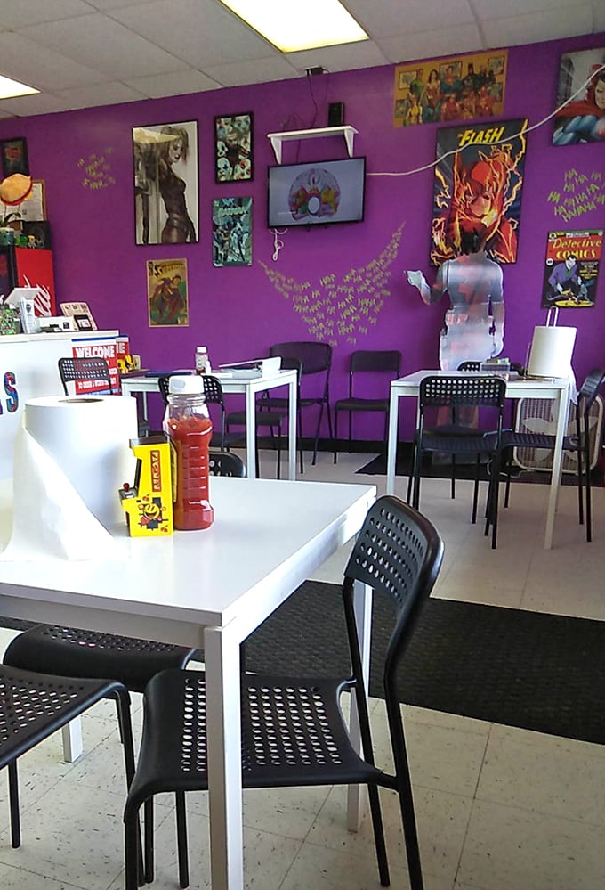 Purple walls and superhero art create a dining room that's part comic convention, part flavor laboratory. The Joker would approve.