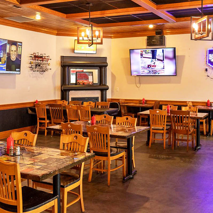 Spacious dining room with TVs and comfortable seating where families gather to worship at the altar of smoke.