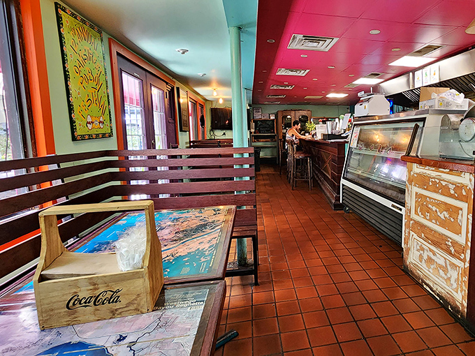 The dining area's colorful charm feels like you've stumbled into a local secret. Those map-topped tables? Navigation tools to flavor country.