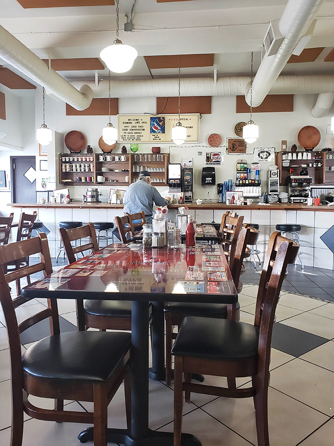 Classic diner charm with checkered floors and wooden chairs &ndash; where conversations flow as freely as the coffee refills.