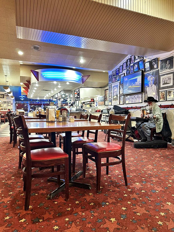 The star-speckled carpet and memorabilia-lined walls create the perfect backdrop for conversations that flow as easily as the coffee refills.