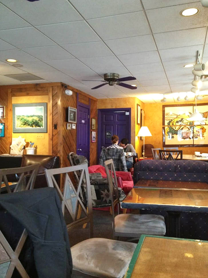 The cozy interior with its wooden charm and purple accents makes even rainy Ohio days feel like a warm embrace.