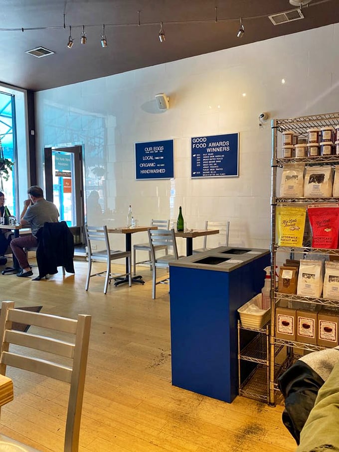 Clean lines, white walls, and shelves of gourmet goods create the perfect backdrop for the serious business of pancake consumption.