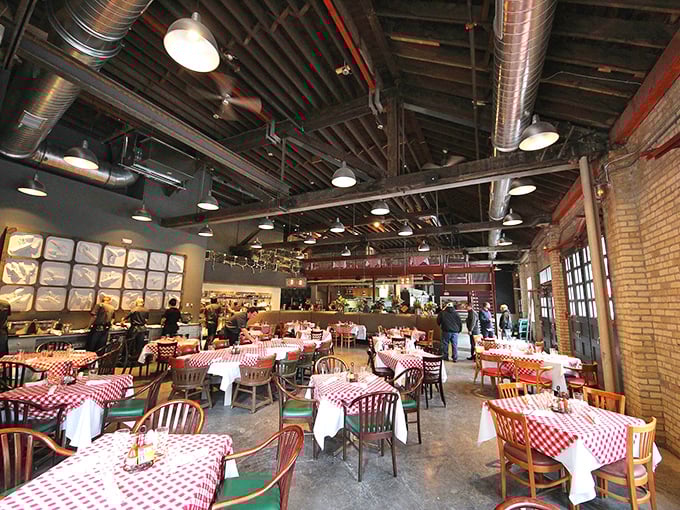 Red-checkered tablecloths and exposed ductwork create that rare vibe where both your fancy aunt and sailor uncle would feel perfectly at home.