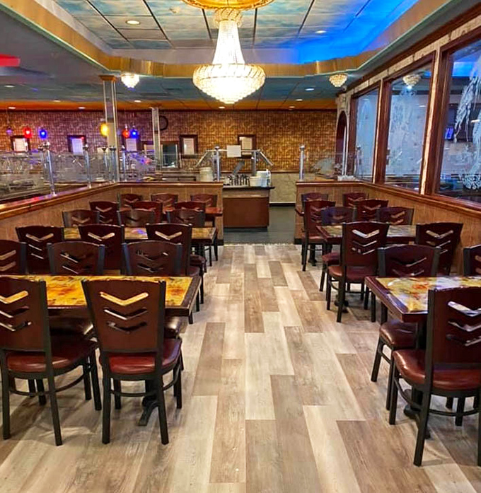 The dining room's warm wood tones and distinctive chairs create that perfect "come as you are" atmosphere where comfort trumps pretension.