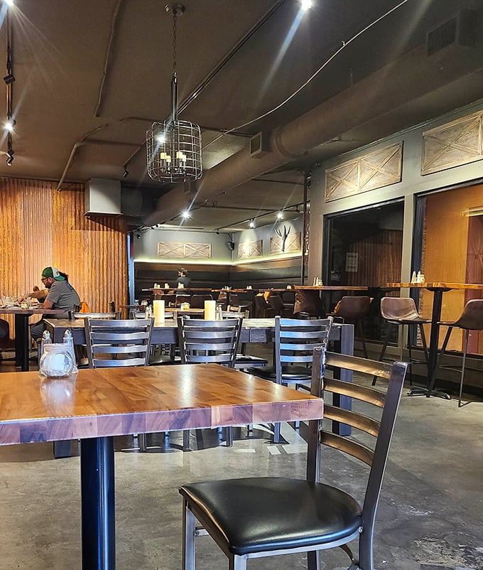 Wooden tables, industrial lighting, and concrete floors create the perfect stage for the real star of the show: what's on your plate.