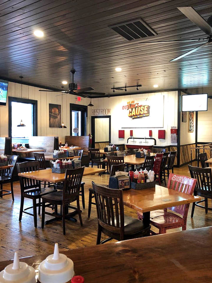 The dining area feels less like a restaurant and more like the community gathering spot where barbecue brings strangers together as friends.
