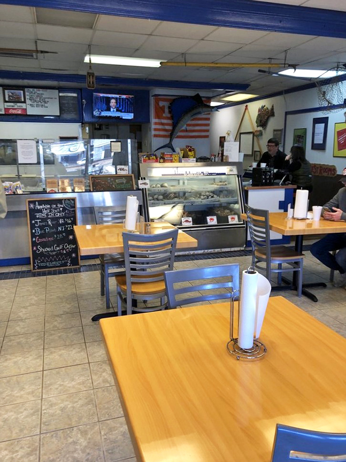 No-frills dining at its finest—where paper towel rolls on tables signal the kitchen's confidence that you'll need them for the delicious mess you're about to make.