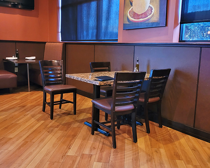 Cozy booths and warm lighting create dining nooks where first dates become engagements and Tuesday dinners transform into cherished memories.