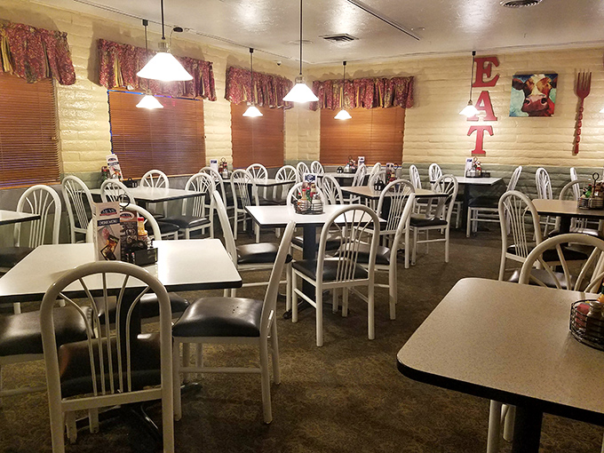 Classic diner seating with "EAT" spelled out on the wall&mdash;as if you needed any encouragement once you smell what's coming from the kitchen.