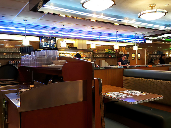 Classic diner booths where countless life decisions have been made, relationships started or ended, and the important question—pancakes or waffles—has been debated.