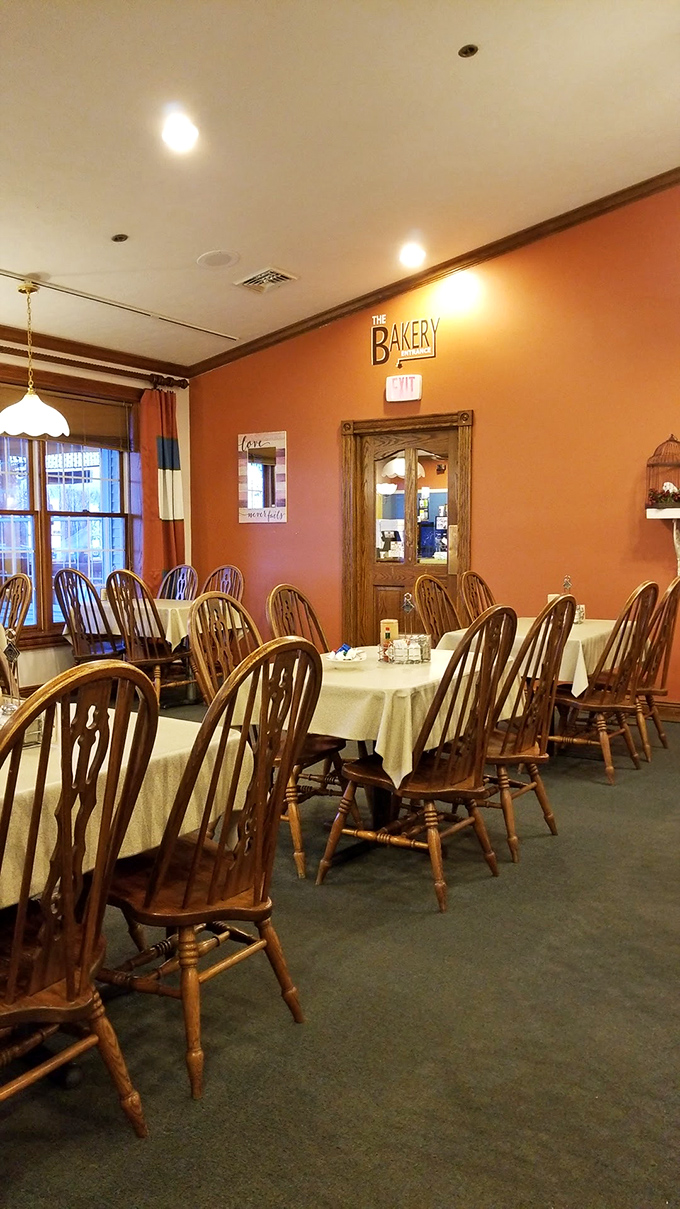 Windsor-back chairs and cream tablecloths create the perfect backdrop for conversations that inevitably begin with "Remember when restaurants felt like this?"