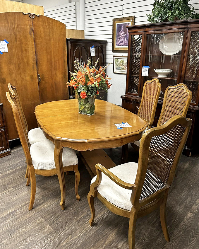 This French Provincial dining set has hosted countless family dinners and is ready for its next chapter. The stories this wood could tell!
