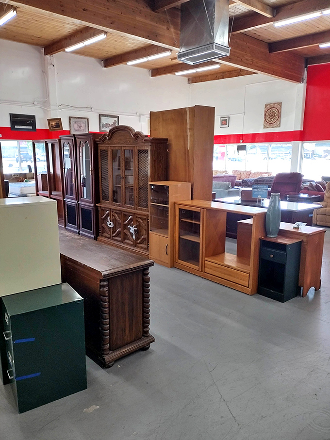 Solid wood cabinets and entertainment centers stand at attention, each piece whispering tales of craftsmanship rarely found in today's furniture.