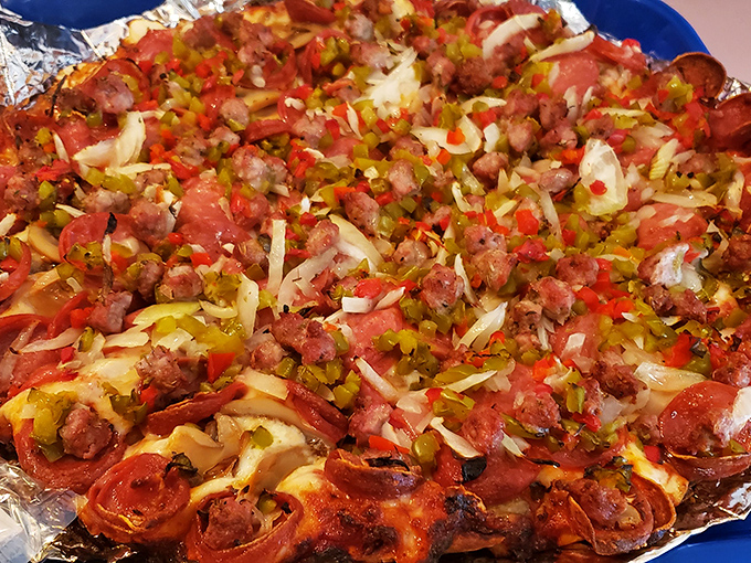 The works pizza&mdash;where every topping earns its place through flavor contribution, not just Instagram-worthy appearance.