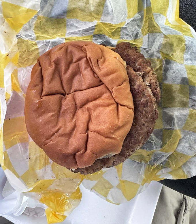 This isn't just a burger; it's a hand-formed testament to simplicity done right—no foams, no truffle oil, just pure American satisfaction.