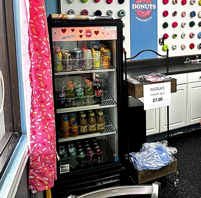 The drink cooler stands ready to provide the perfect liquid companion to your donut adventure. Because greatness deserves proper hydration.