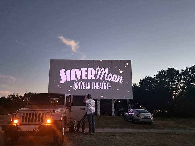 Dusk transforms the screen into a glowing portal, the Silver Moon logo hovering like a promise of cinematic adventures ahead.