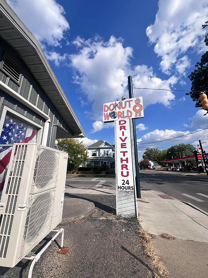 The iconic Donut World sign against a perfect blue Ohio sky&mdash;a siren call to carb enthusiasts and a landmark for locals in the know.