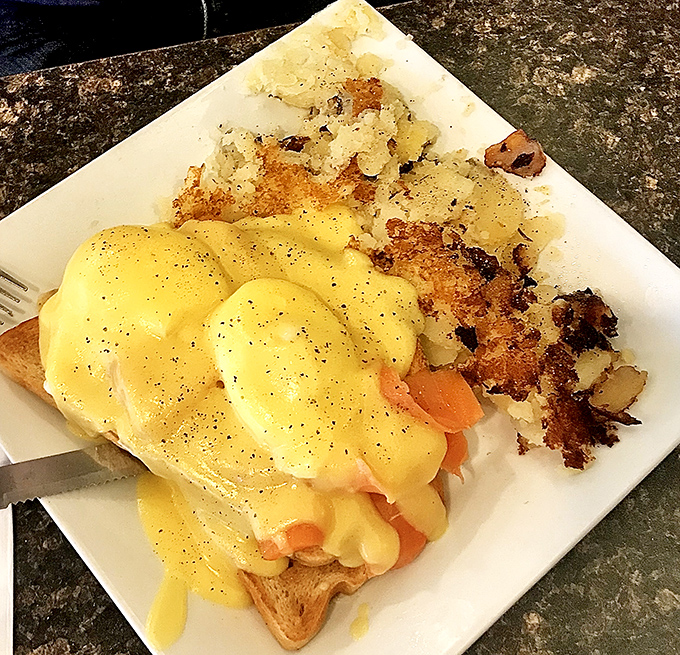 Eggs Benedict that doesn't just break the yolk—it breaks the internet. That hollandaise sauce is performing miracles on an English muffin stage.