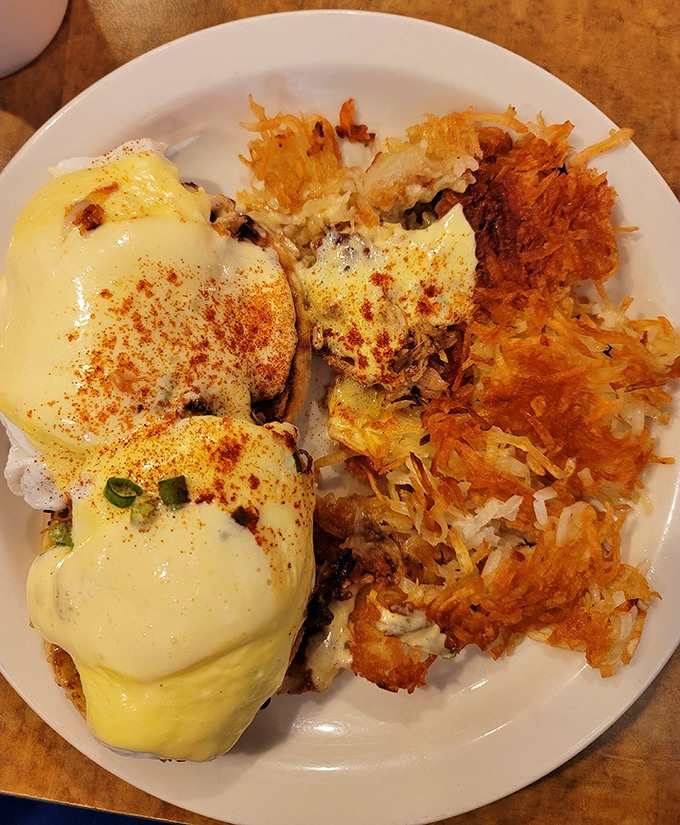 Eggs Benedict with hashbrowns that achieved the impossible – both crispy and fluffy. A masterclass in breakfast engineering.