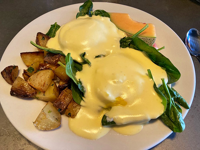 The Egg Florentine that launched a thousand return visits. That hollandaise sauce is sunshine on a plate, and those potatoes deserve their own fan club.