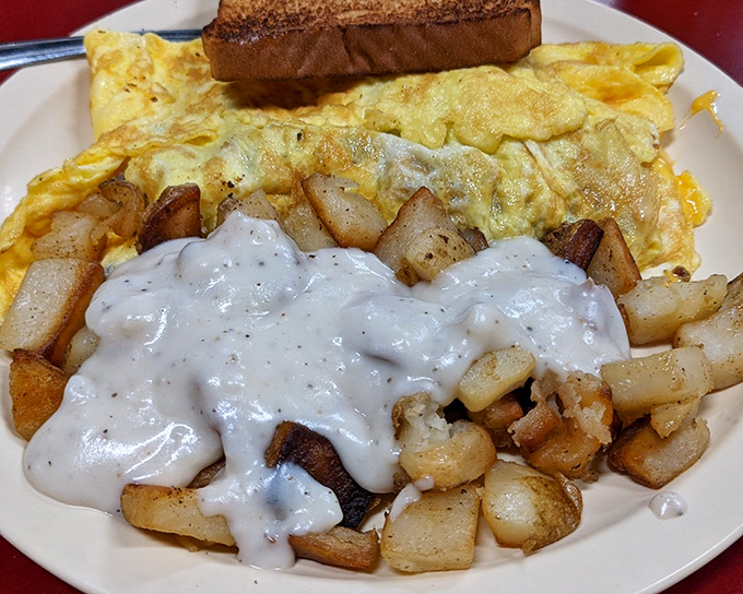 Simple perfection on a plate. Those home fries look like they've been given a PhD in proper breakfast potato preparation.